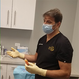 Dr. Pancholi speaking at Indie Bio Demo Admiring MiniTC Dr. Guarino